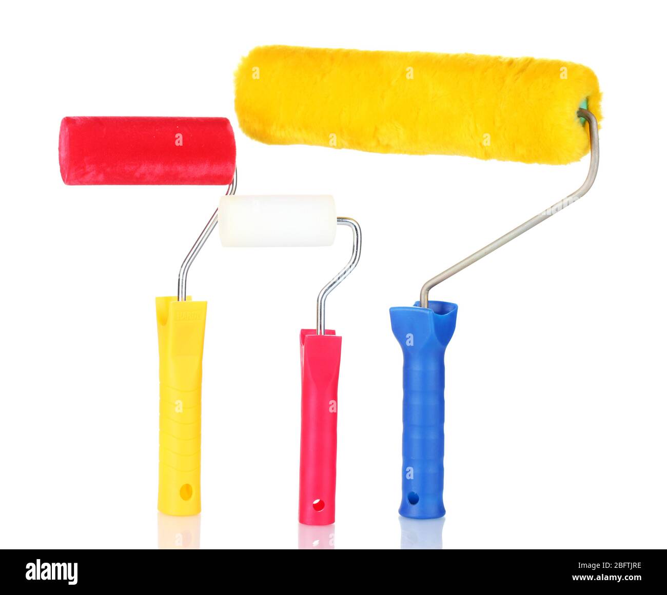 Paint rollers isolated on white Stock Photo - Alamy