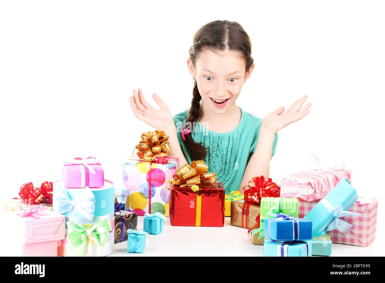 Little girl with gifts isolated on white Stock Photo - Alamy