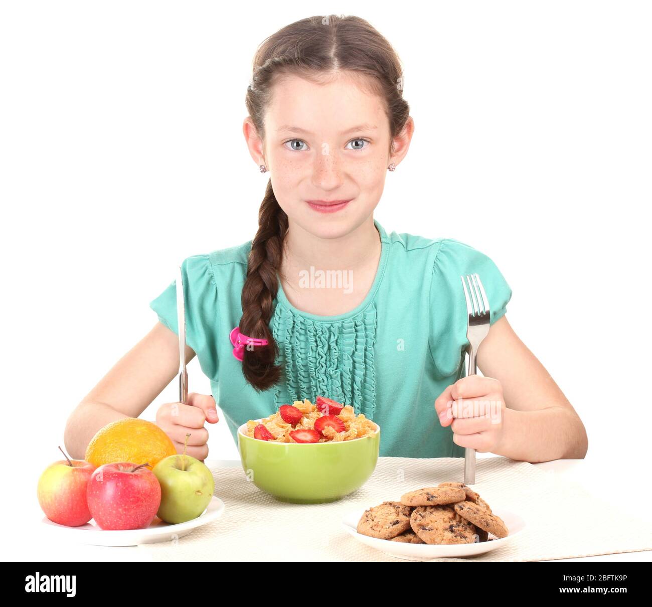 little beautiful girl have a breakfast on white background Stock Photo ...
