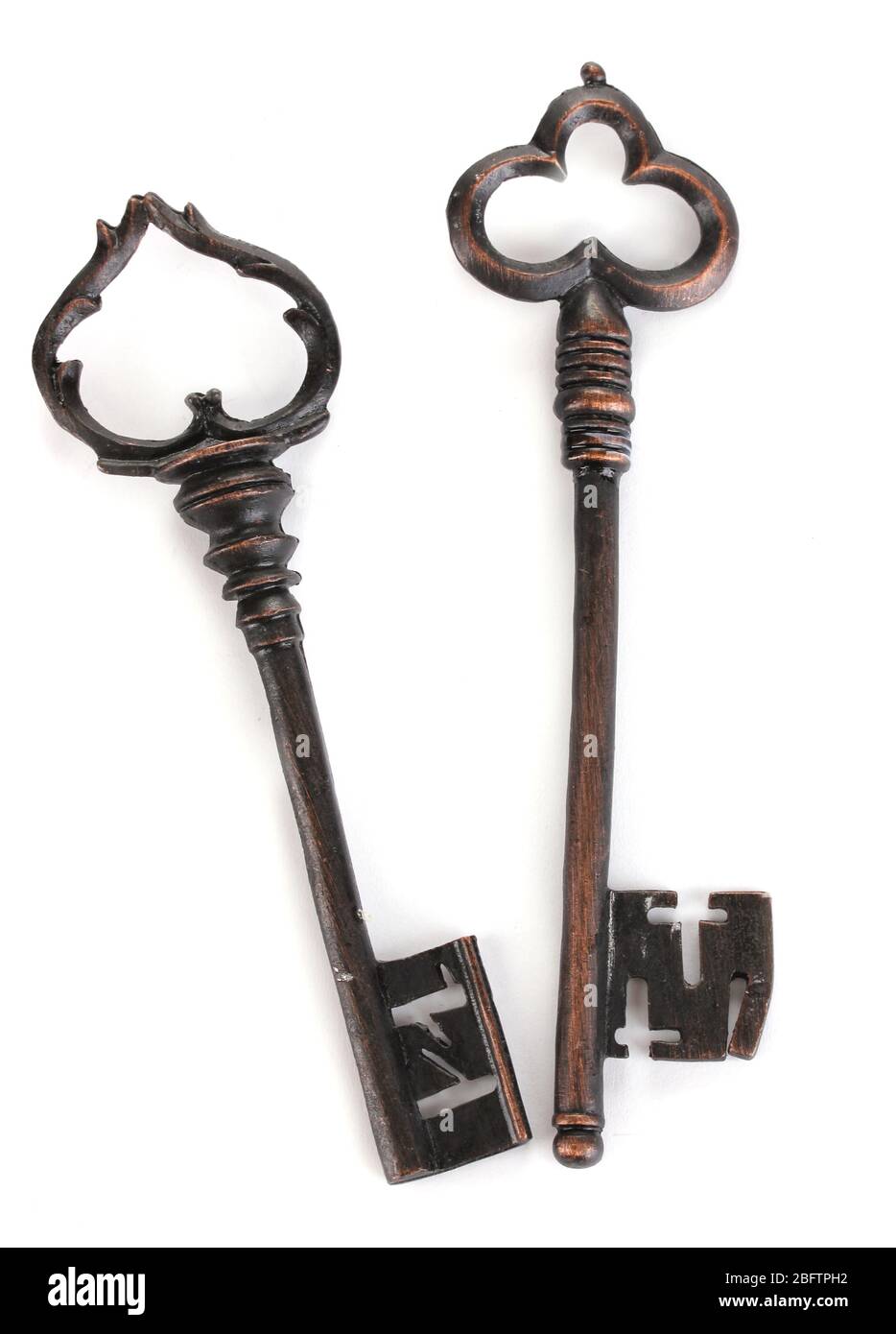 Two antique keys isolated on white Stock Photo - Alamy