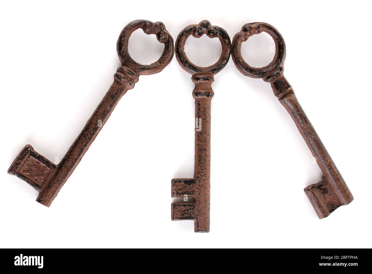 a bunch of antique keys isolated on white Stock Photo - Alamy