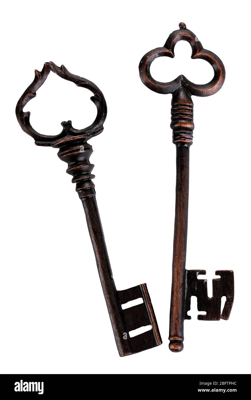 Two antique keys isolated on white Stock Photo - Alamy
