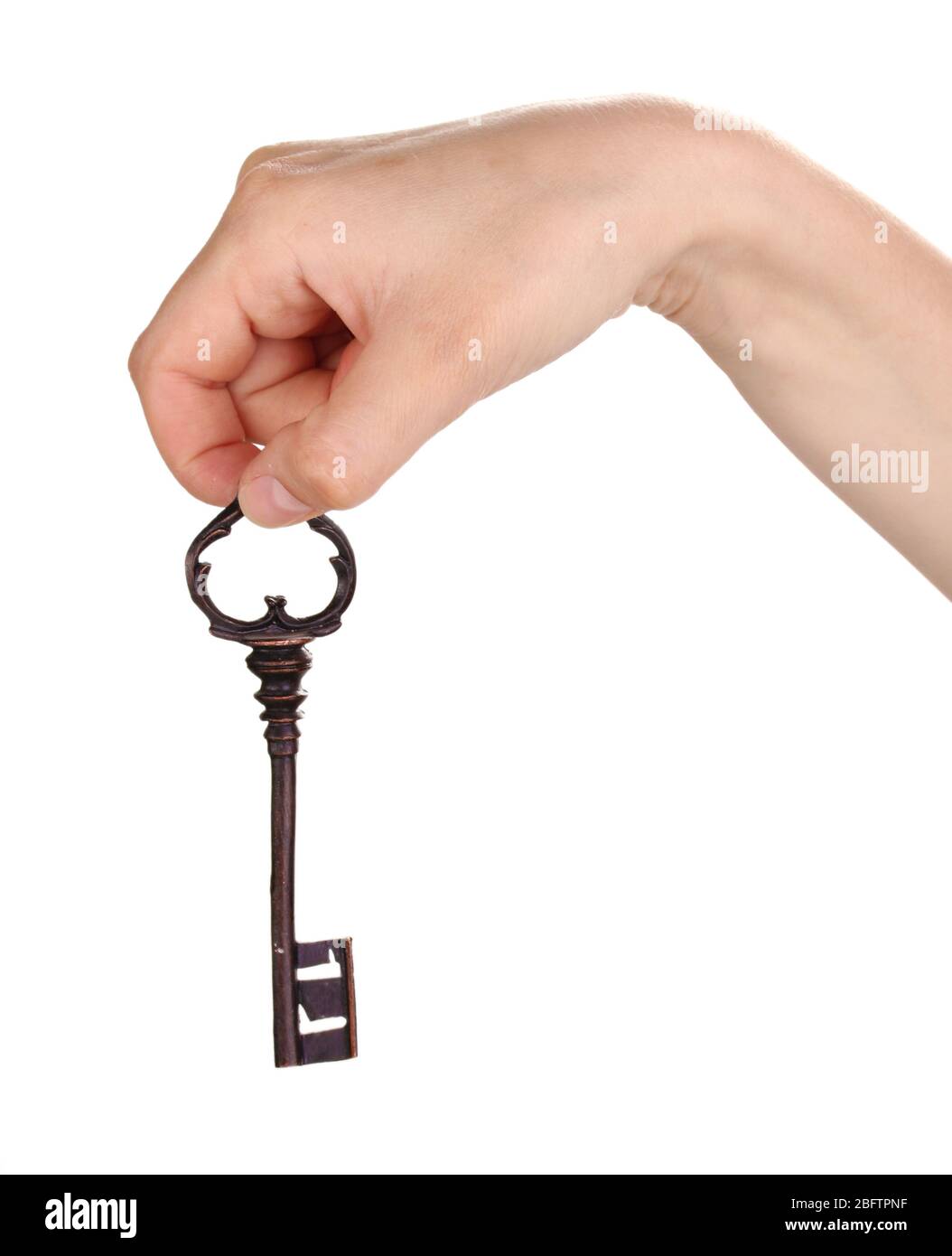 woman's hand holding an antique key on white background Stock Photo - Alamy