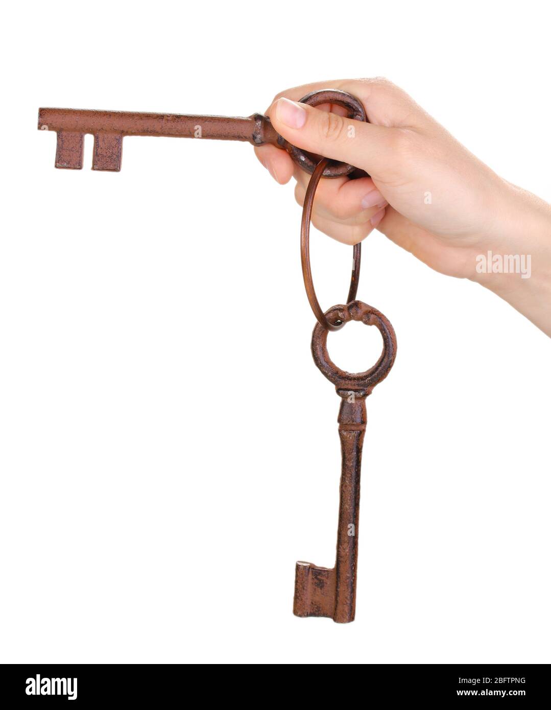 woman's hand holding an antique key on white background Stock Photo - Alamy