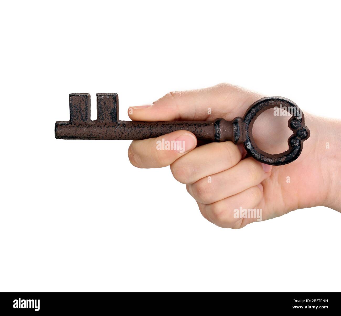 woman's hand holding an antique key on white background Stock Photo - Alamy