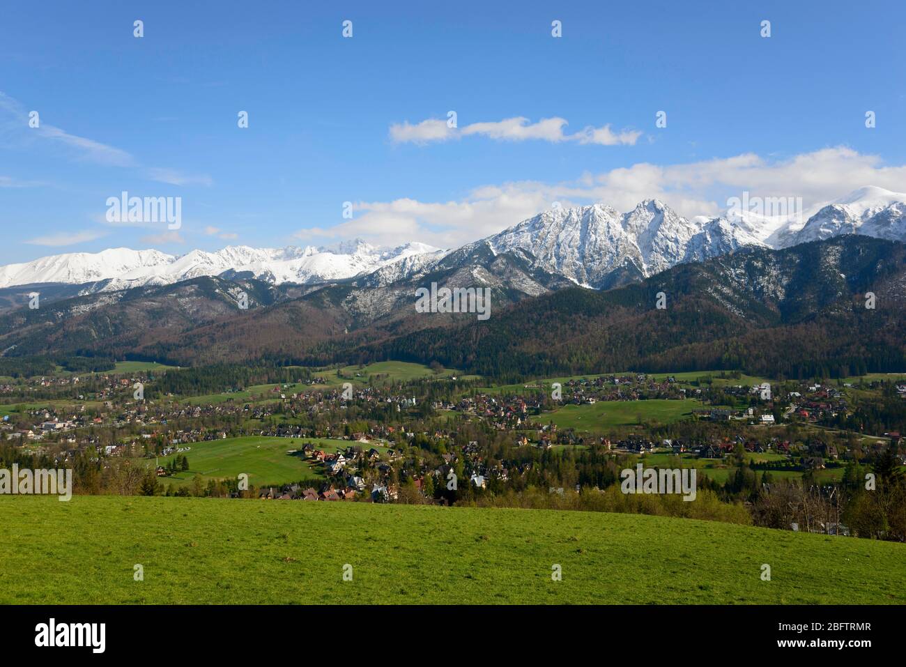 View of Zakopane and snowy mountains of the High Tatras, Podhale ...