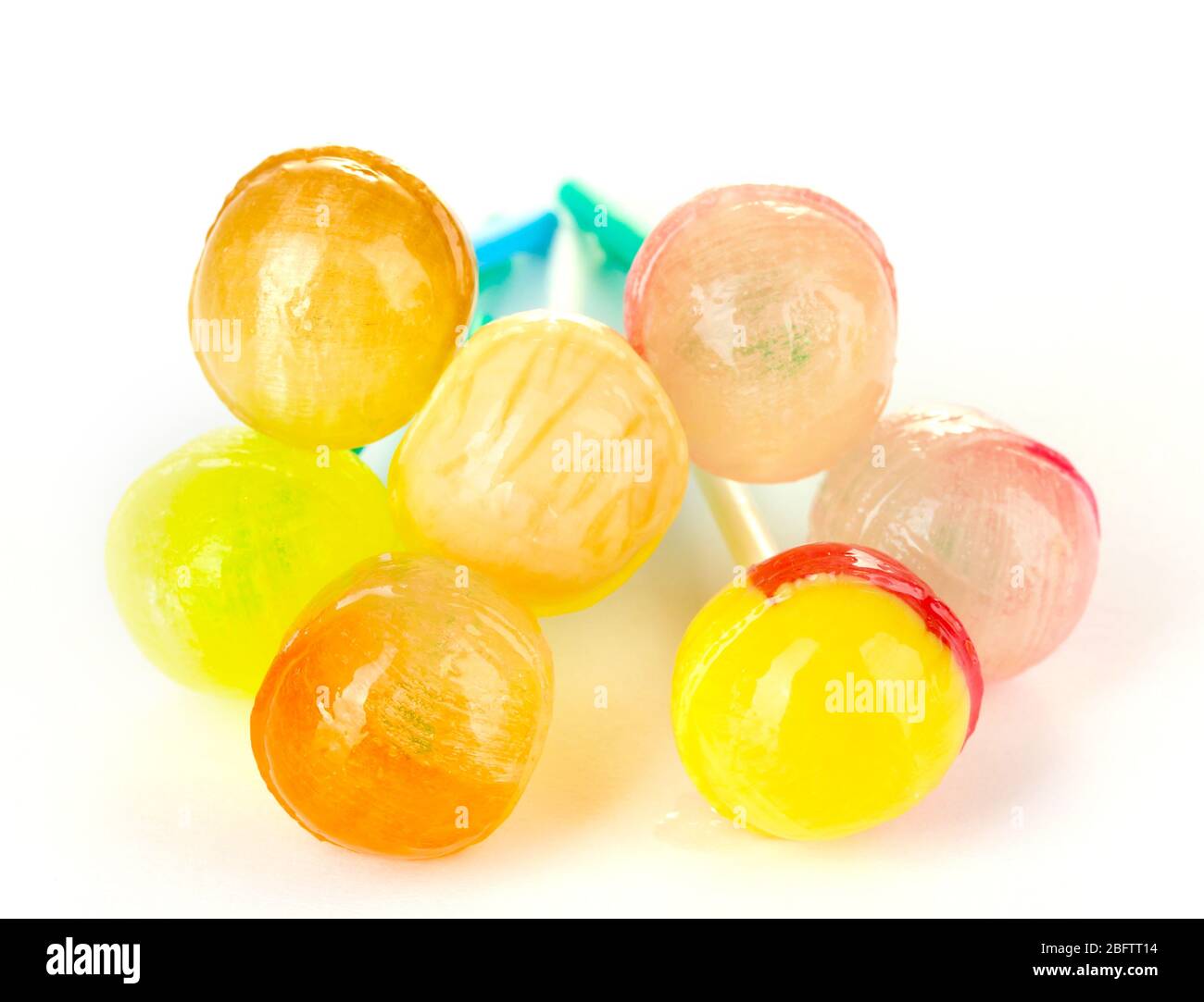 Many delicious lollipops isolated on white Stock Photo - Alamy