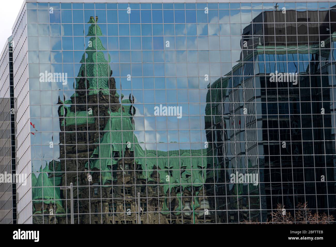 reflections on a glass tower in downtown Ottawa Stock Photo - Alamy