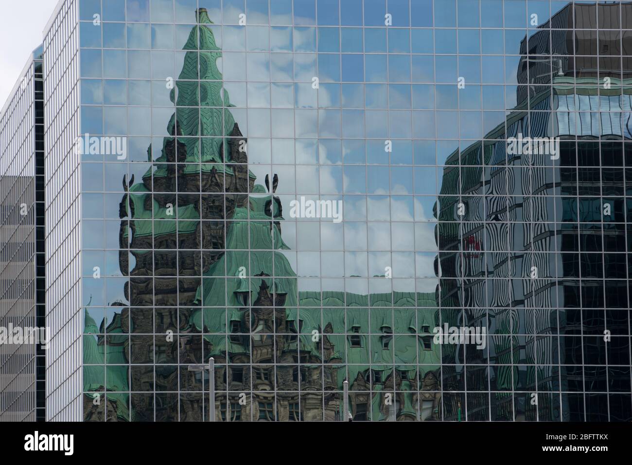 reflections on a glass tower in downtown Ottawa Stock Photo - Alamy