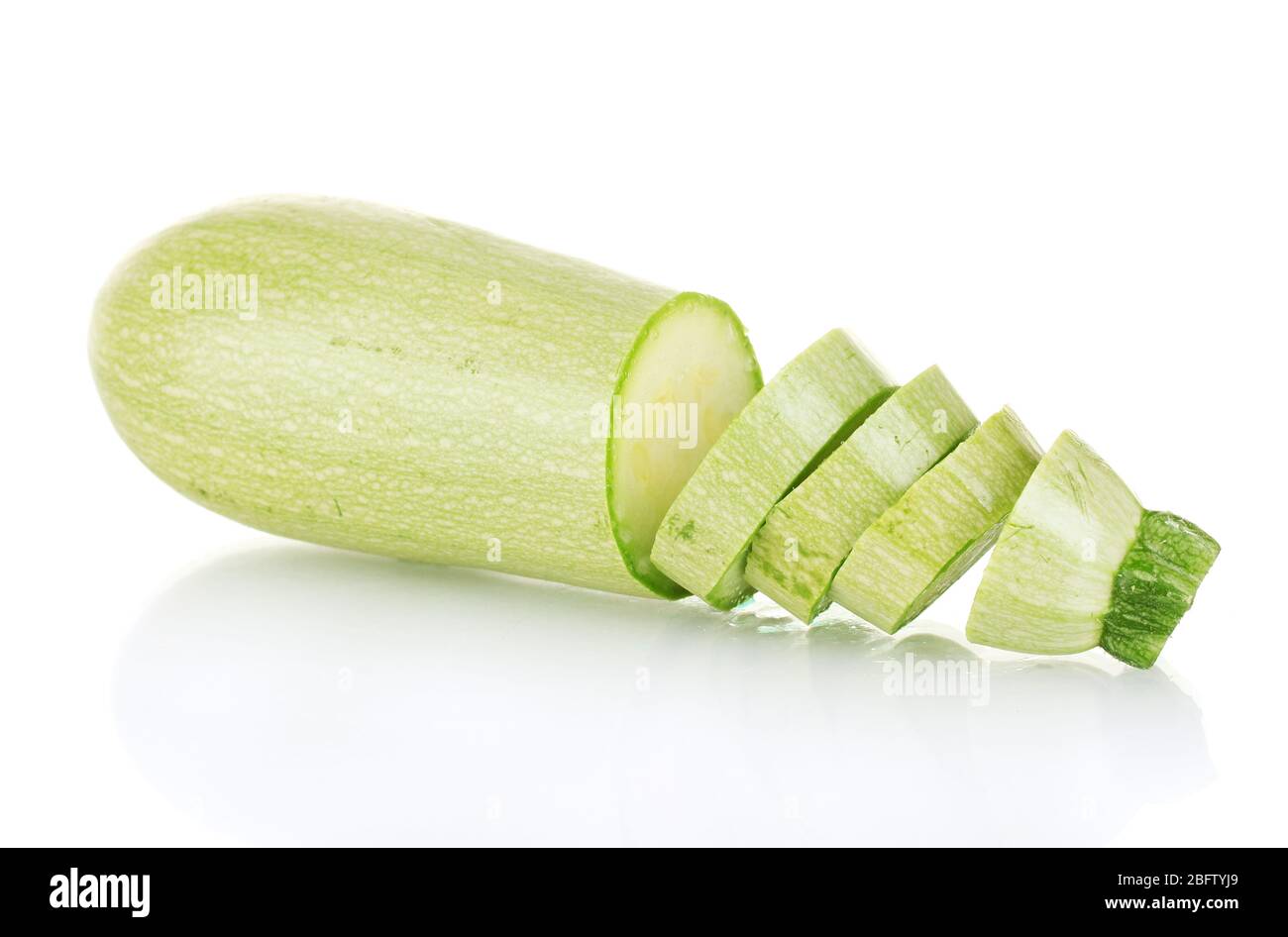 sliced squash isolated on white Stock Photo - Alamy