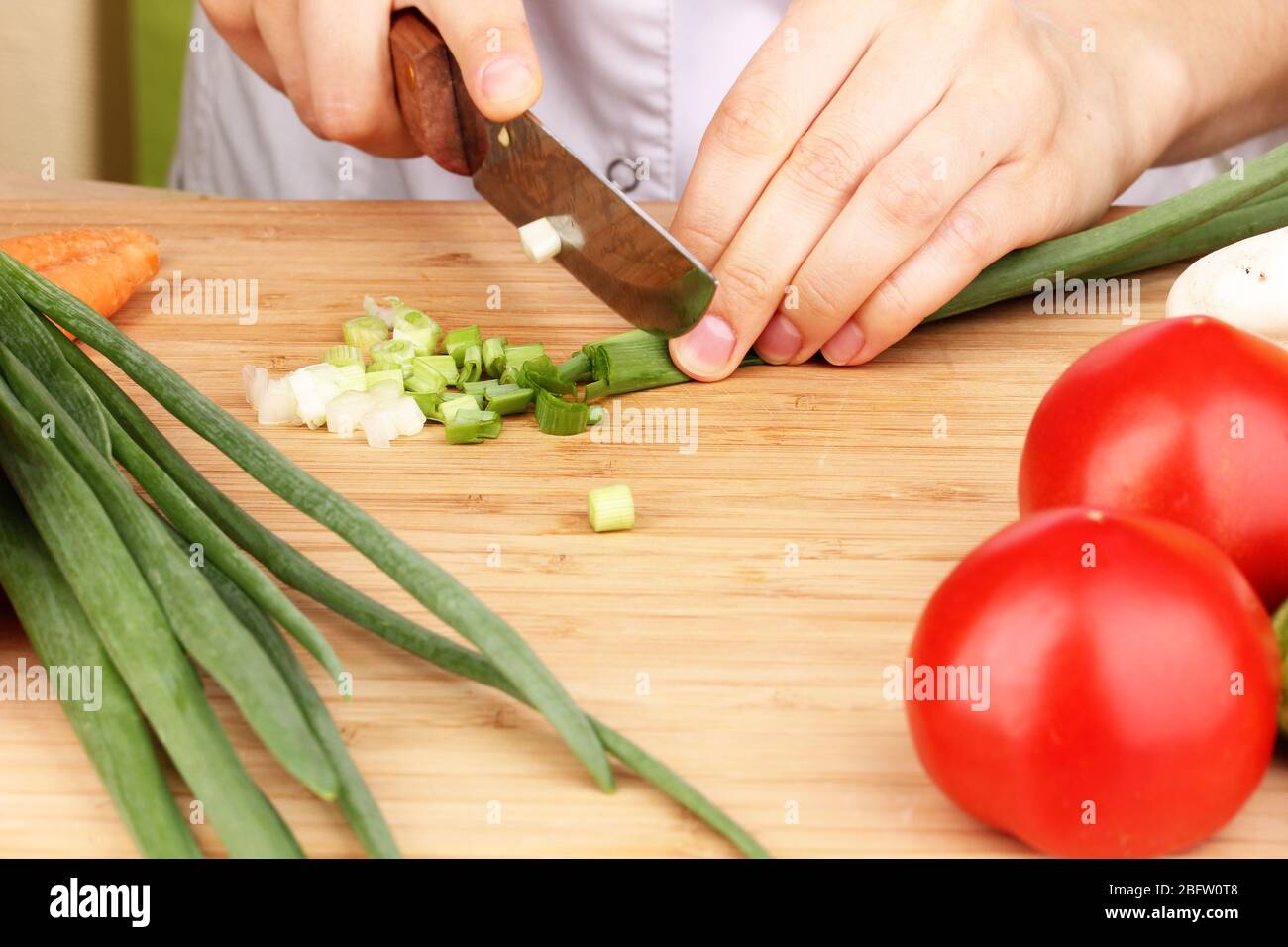 Chopping food ingredients Stock Photo - Alamy