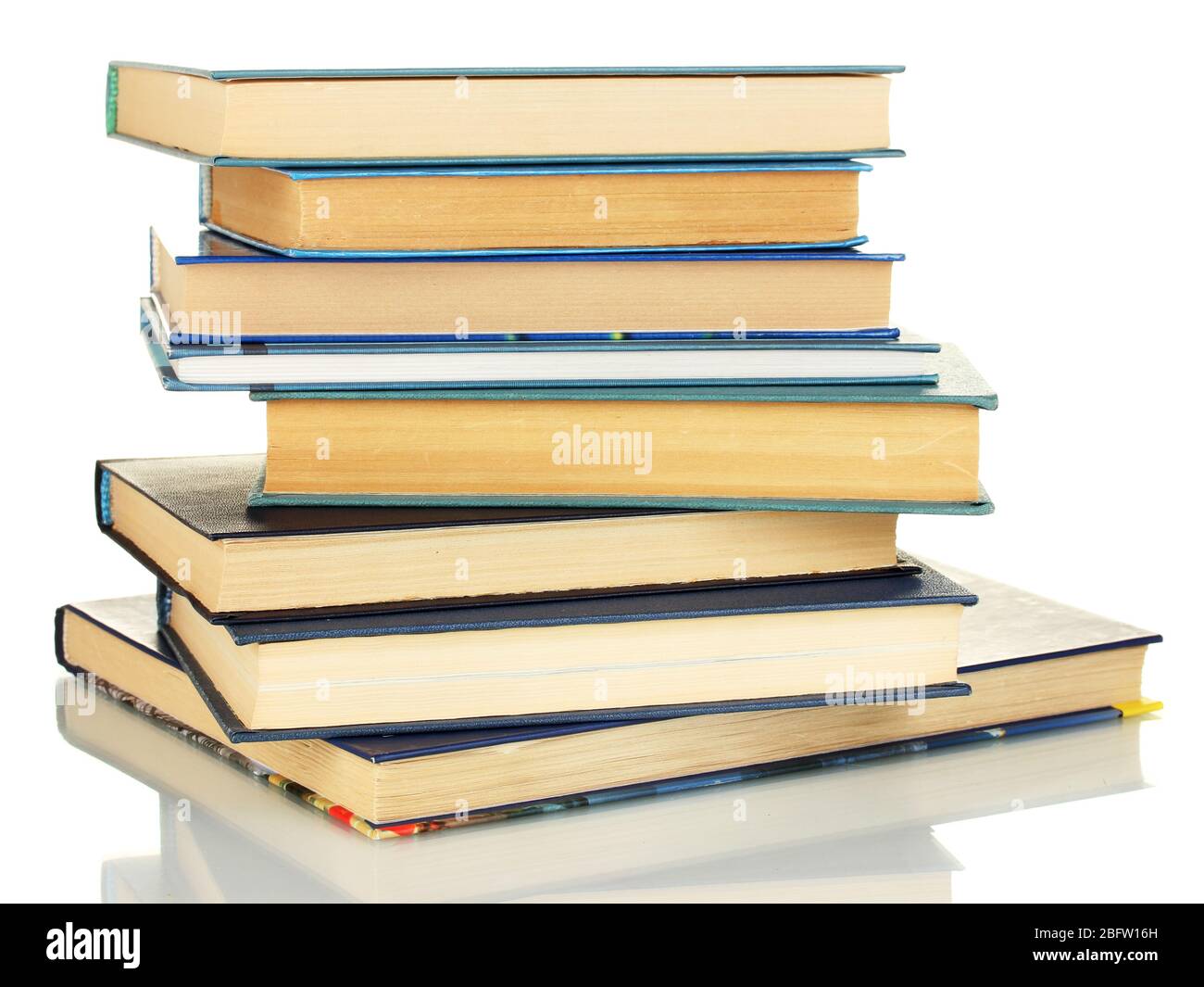 Tower of books isolated on white Stock Photo - Alamy