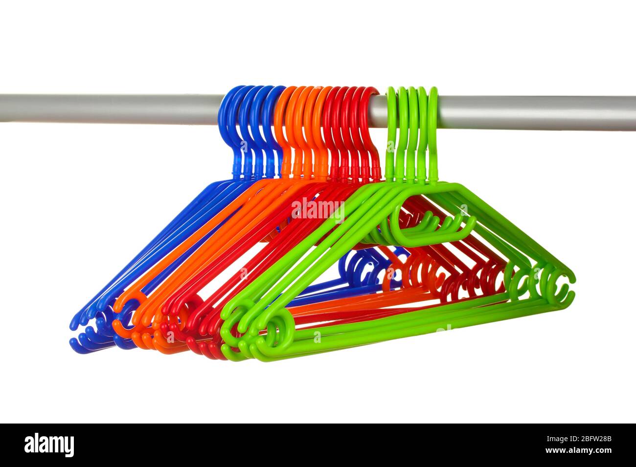 plastic hangers in row isolated on white Stock Photo - Alamy
