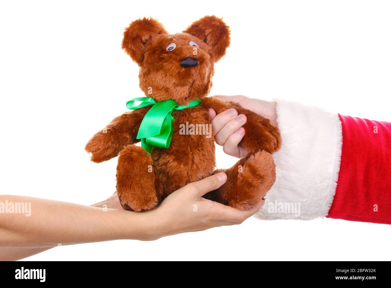 Santa Claus hand holding toy bear isolated on white Stock Photo - Alamy