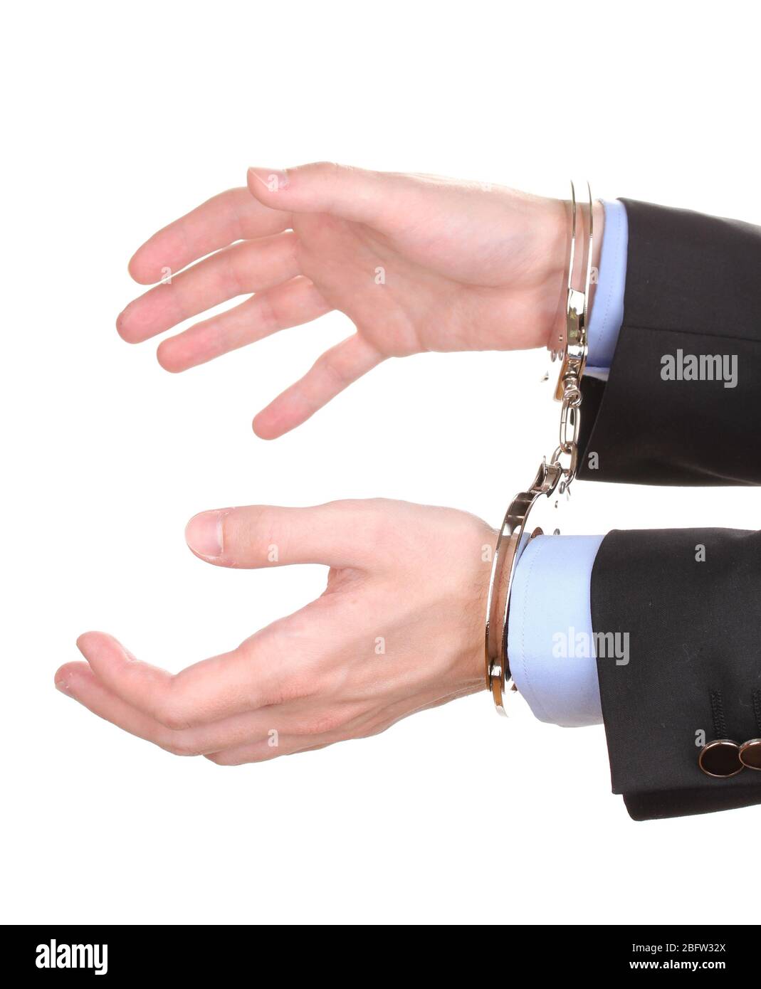 Businessman hands fettered with handcuffs isolated on white Stock Photo ...