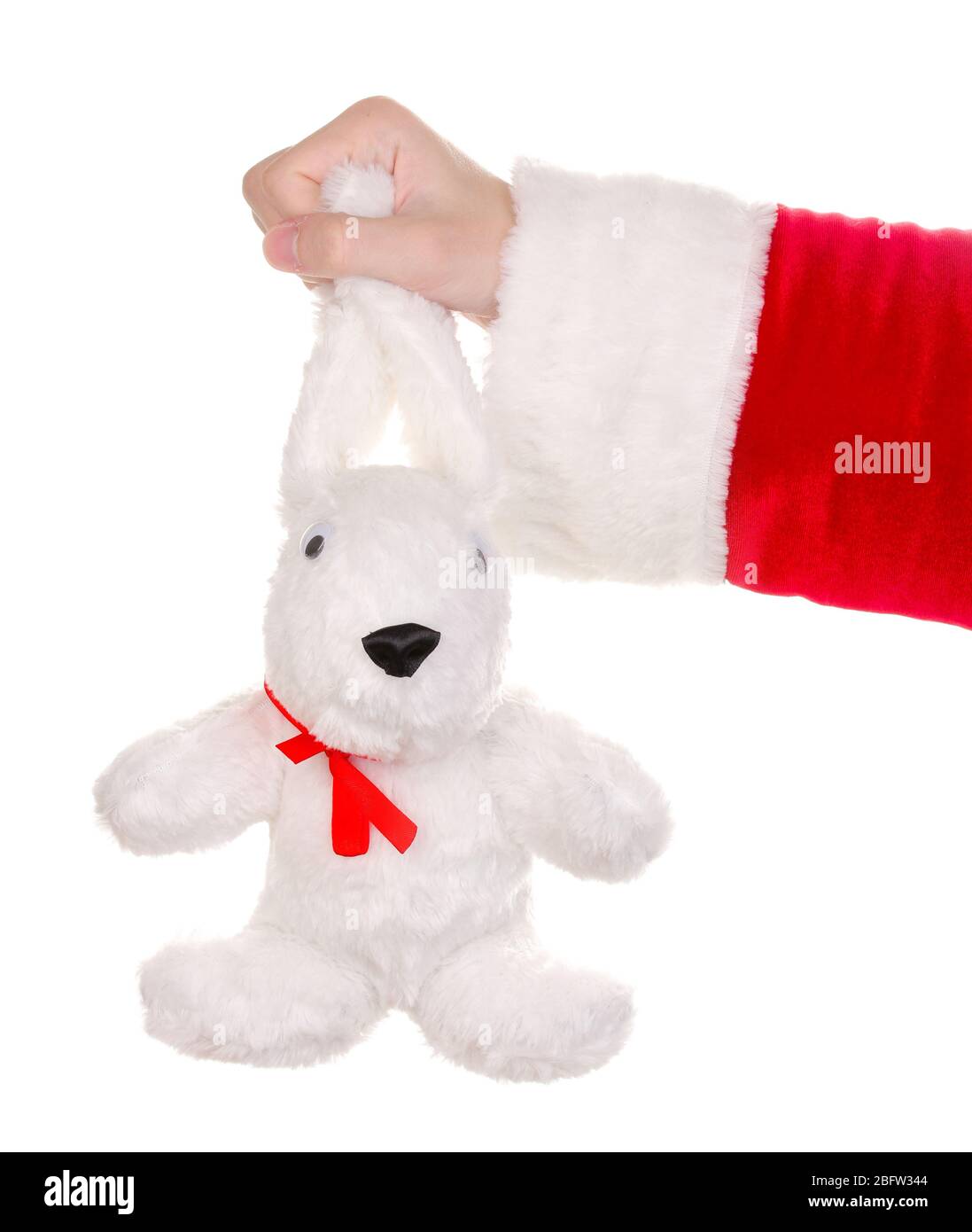 Santa Claus hand holding toy rabbit isolated on white Stock Photo - Alamy