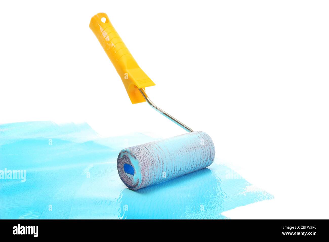 Paint roller with blue paint isolated on white Stock Photo - Alamy