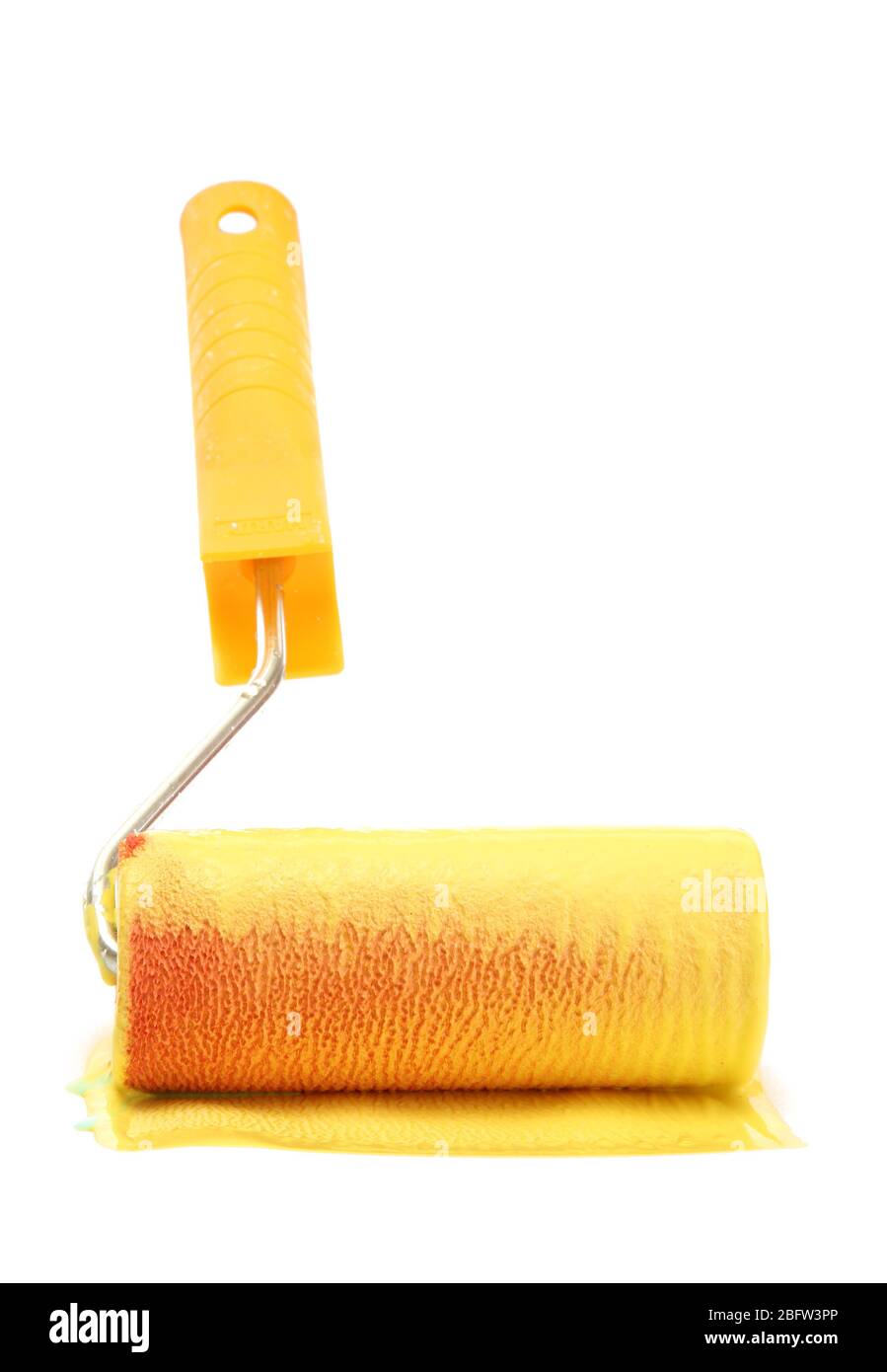 Paint roller with yellow paint isolated on white Stock Photo - Alamy
