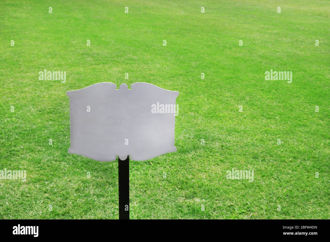 Signboard on lawn Stock Photo - Alamy