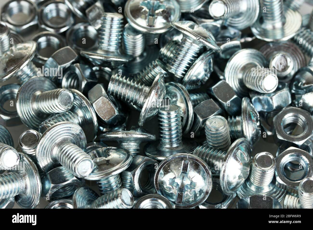 Chrome nuts and bolts close-up Stock Photo - Alamy