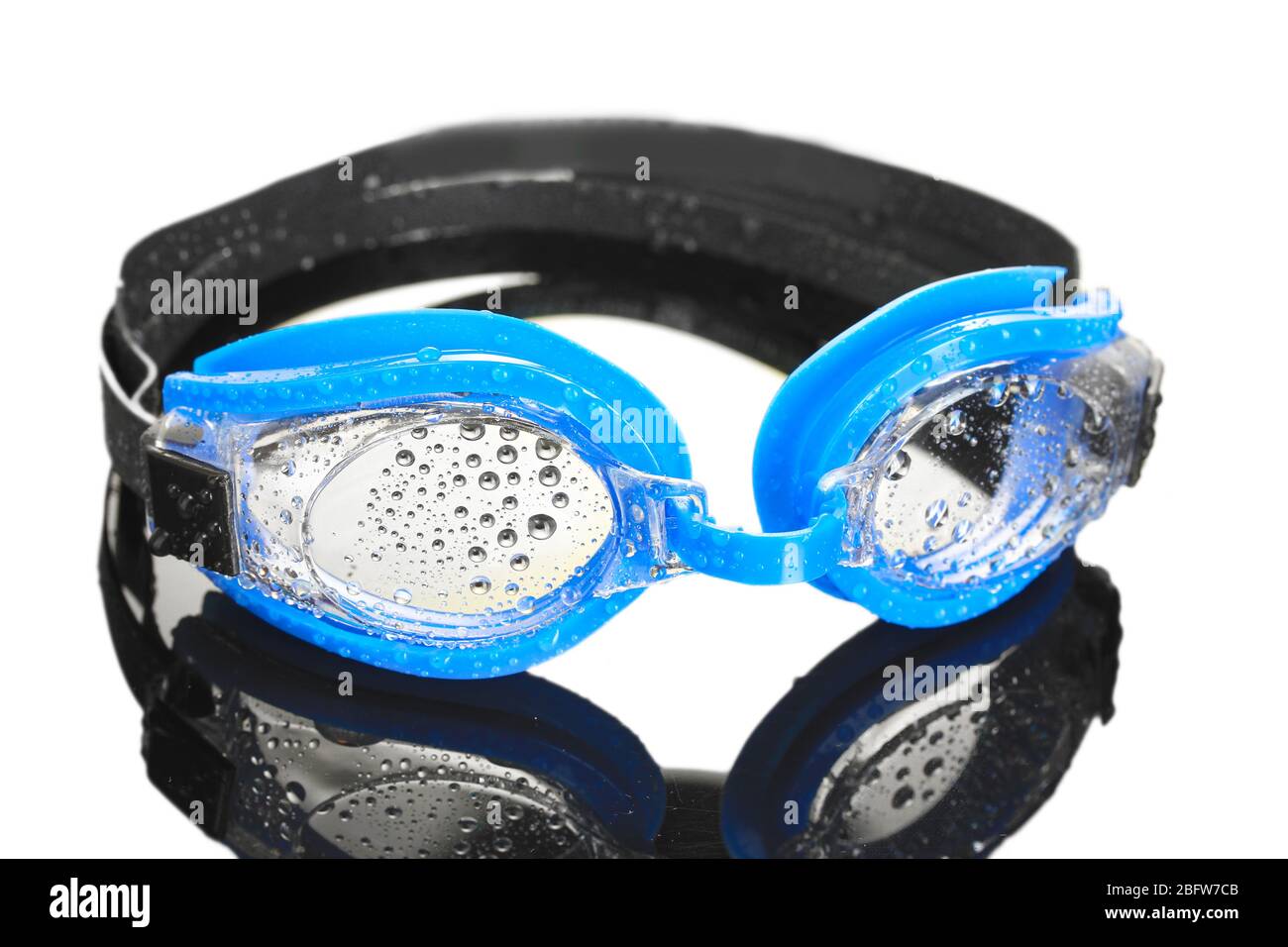 blue swim goggles with drops on grey background Stock Photo - Alamy
