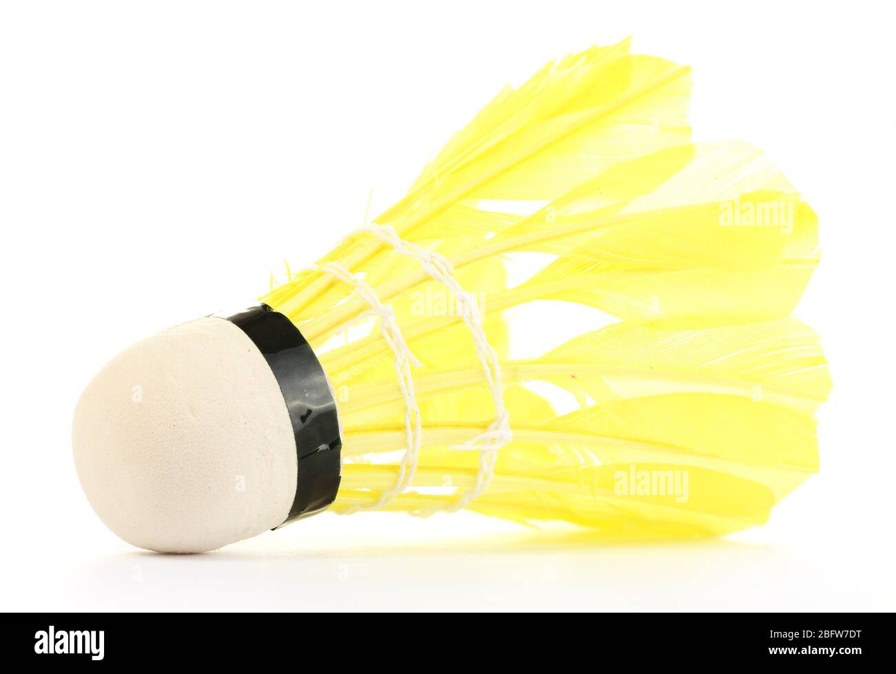 yellow feather shuttlecock isolated on white Stock Photo - Alamy