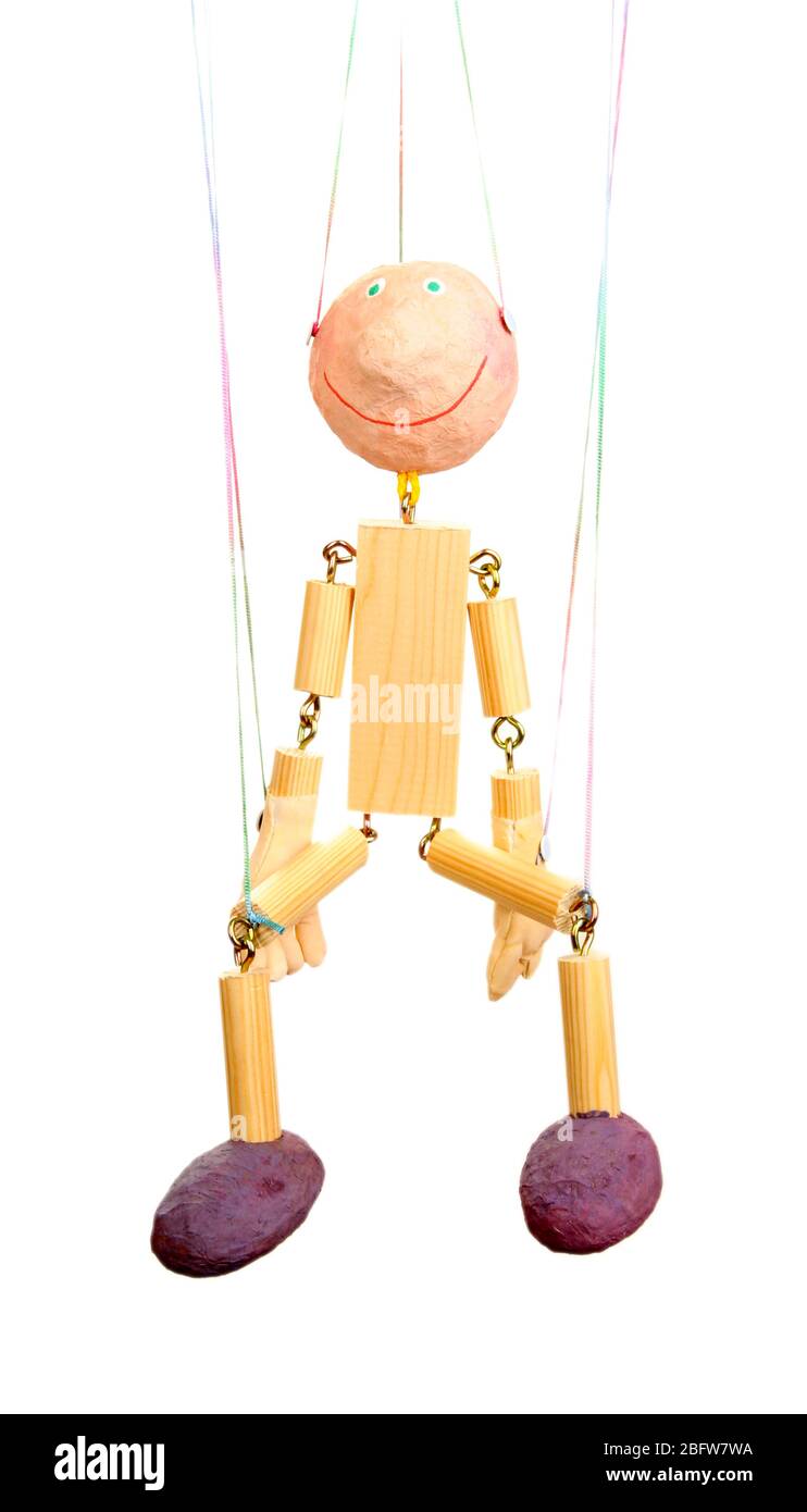 Wooden puppet isolated on white Stock Photo - Alamy