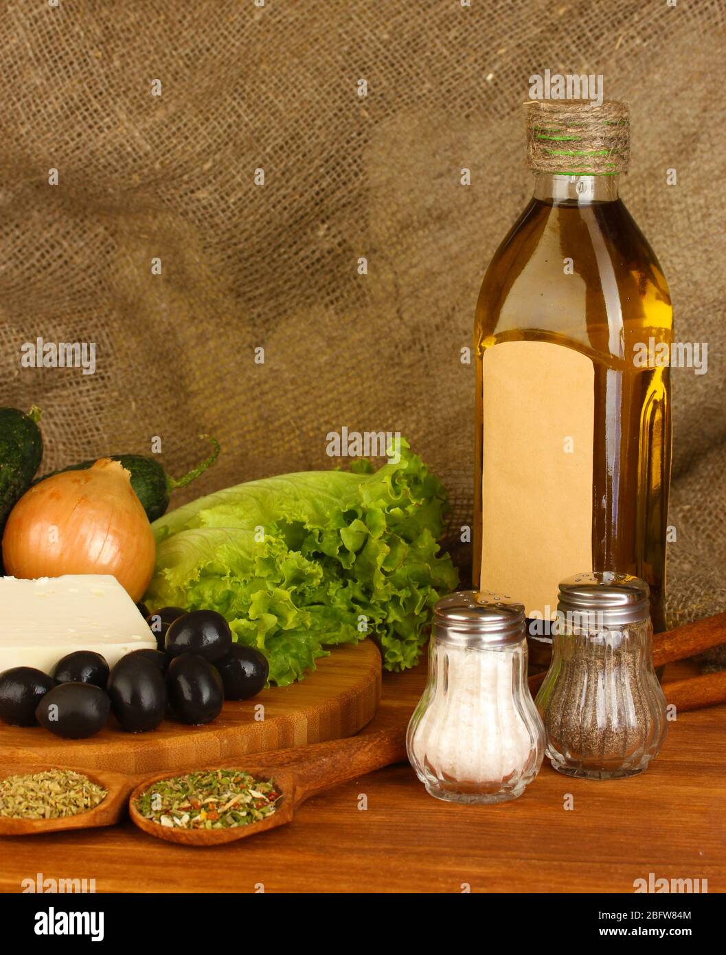 Ingredients for a Greek salad on canvas background close-up Stock Photo ...