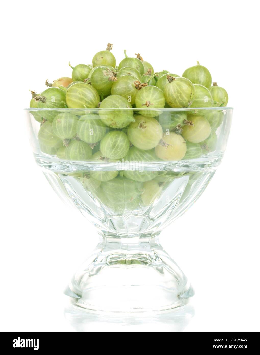 Green gooseberry in glass isolated on white Stock Photo - Alamy