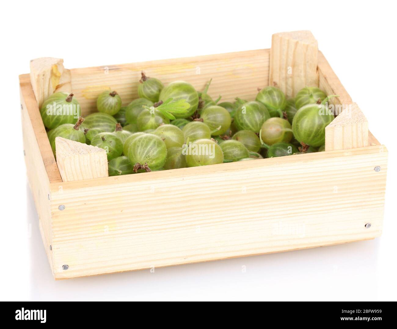 Green gooseberry in crate isolated on white Stock Photo - Alamy