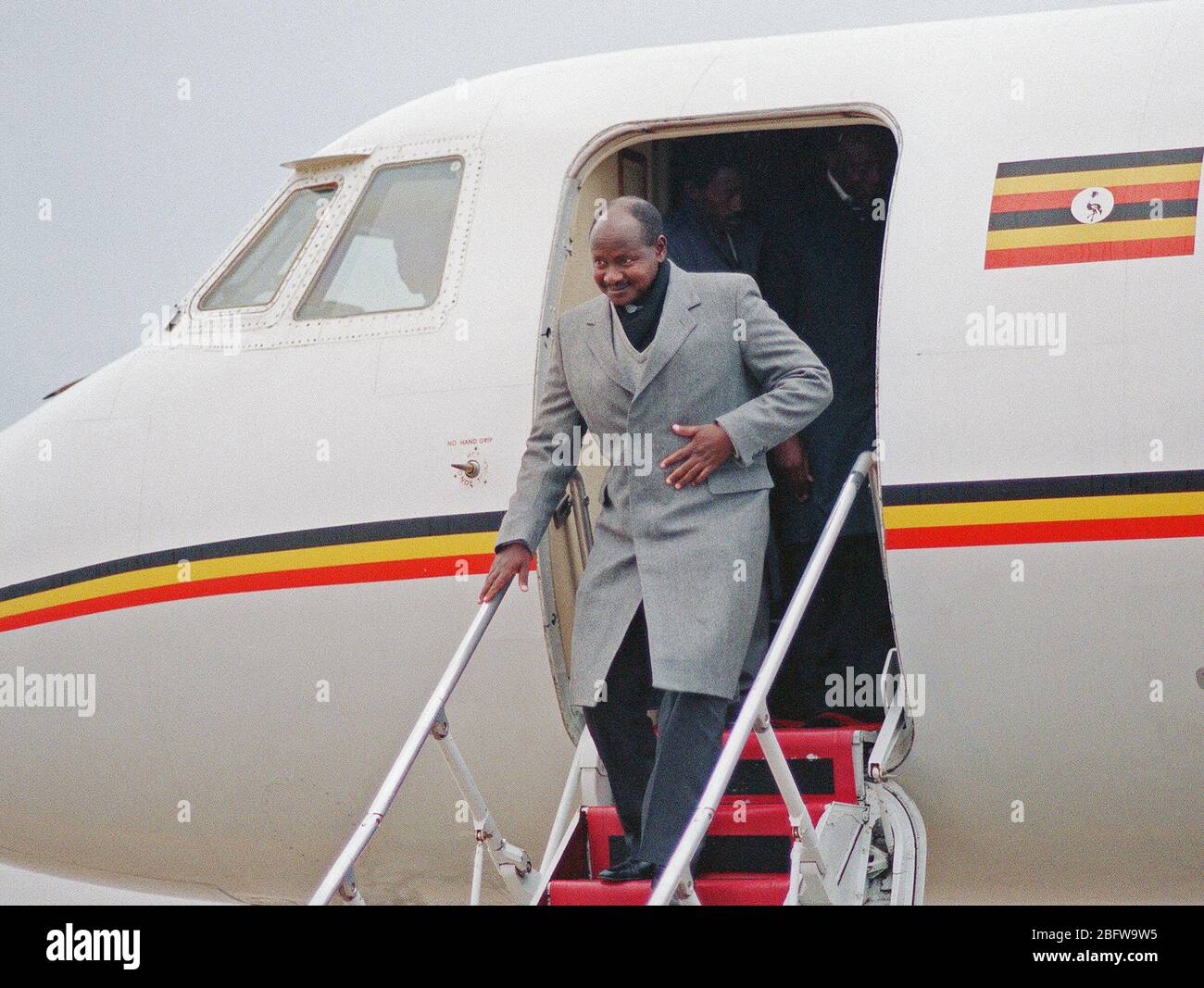 H.E. Yoweri Museveni, President of Uganda, disembarks from an airliner ...