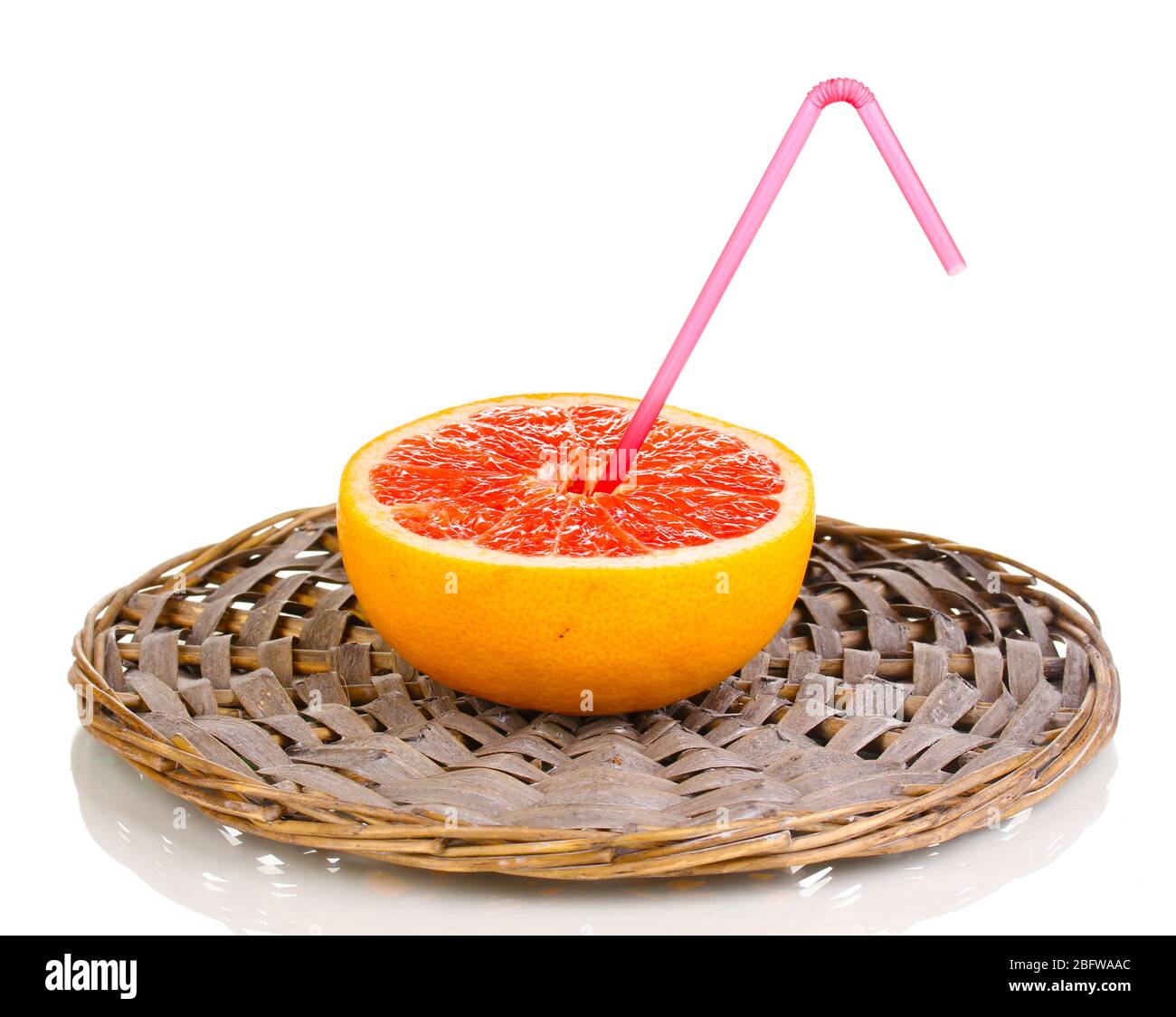 Half of ripe grapefruit with tube isolated on white Stock Photo - Alamy