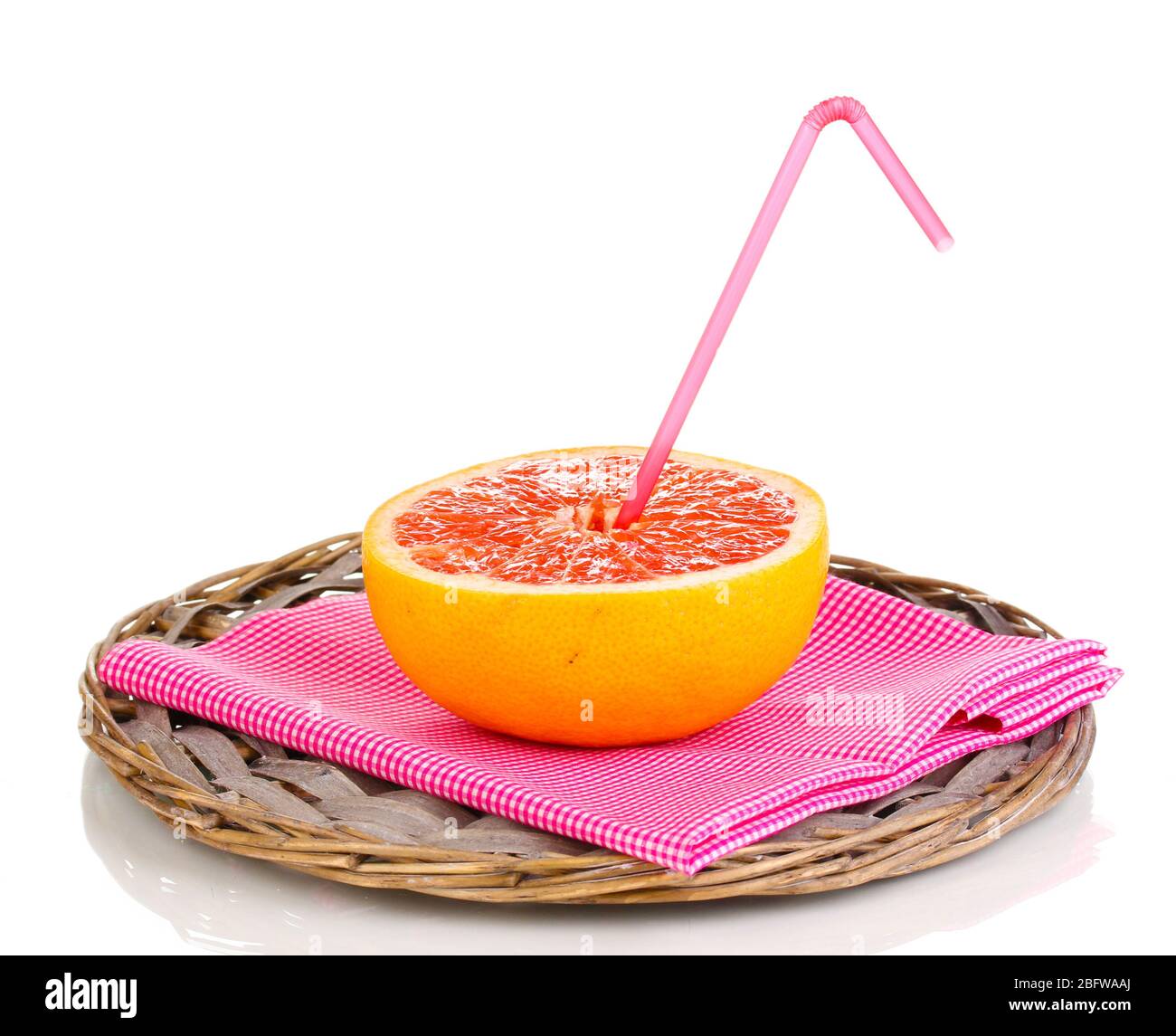 Half of ripe grapefruit with tube isolated on white Stock Photo - Alamy