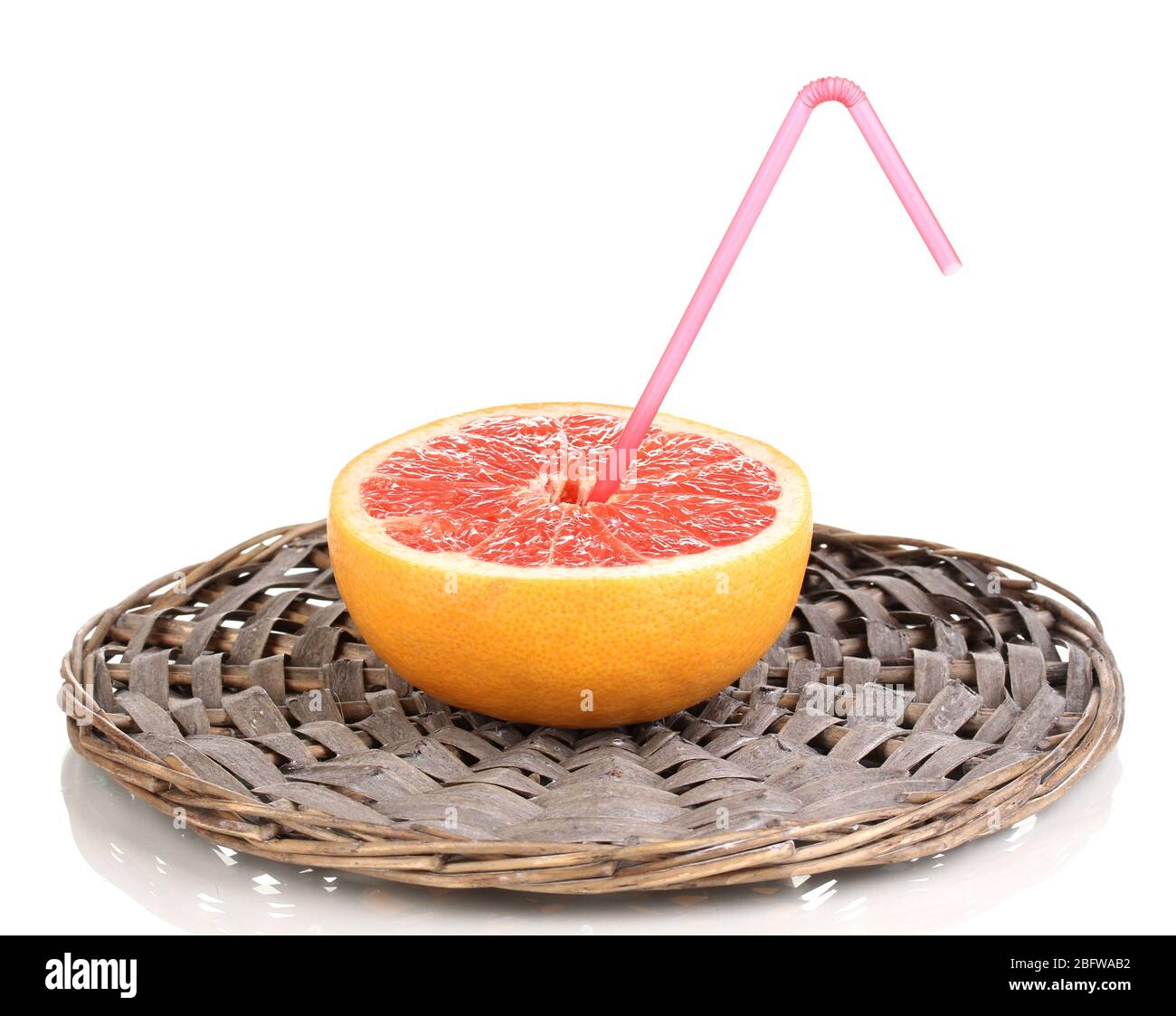 Half of ripe grapefruit with tube isolated on white Stock Photo - Alamy