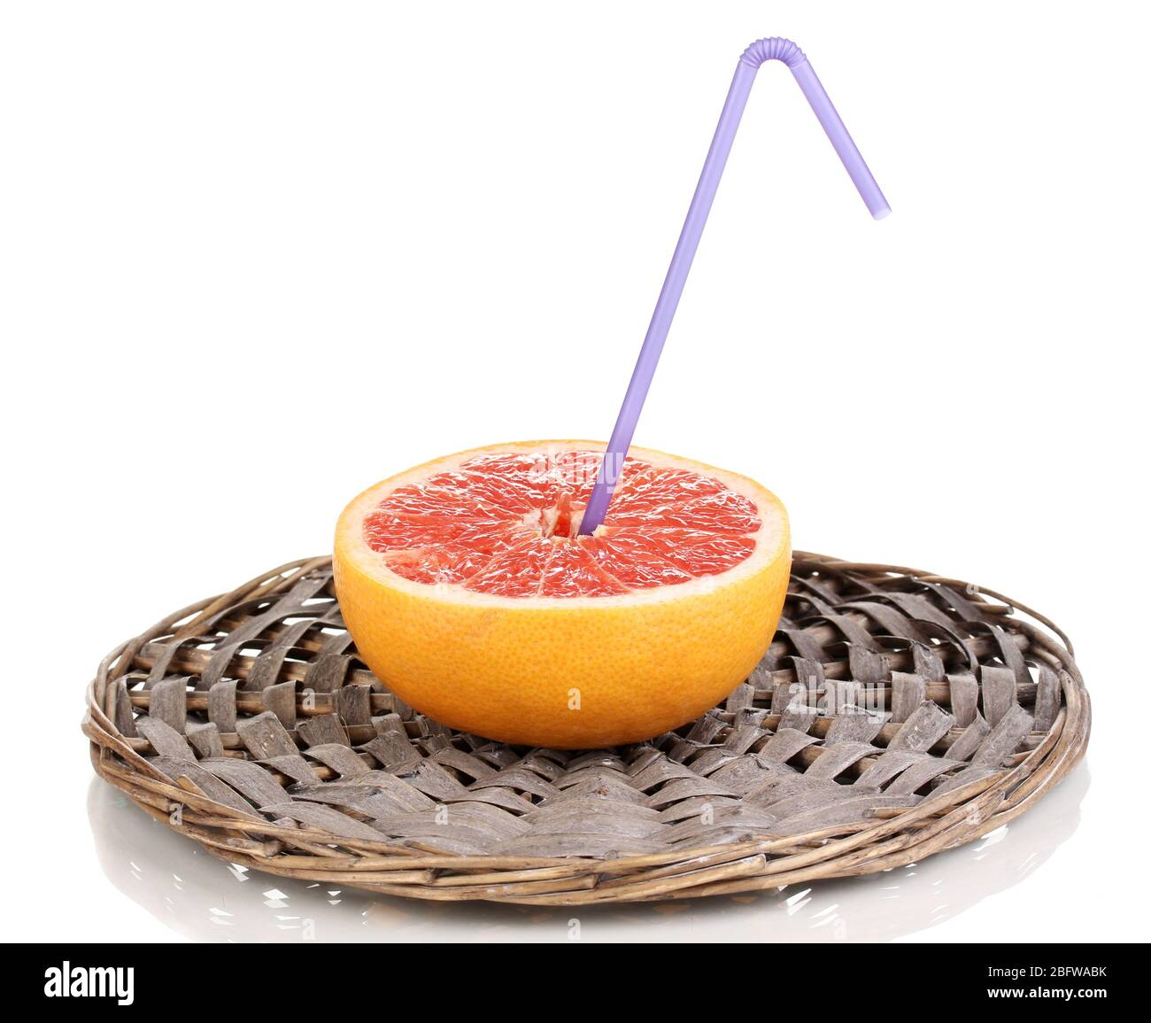 Half of ripe grapefruit with tube isolated on white Stock Photo - Alamy