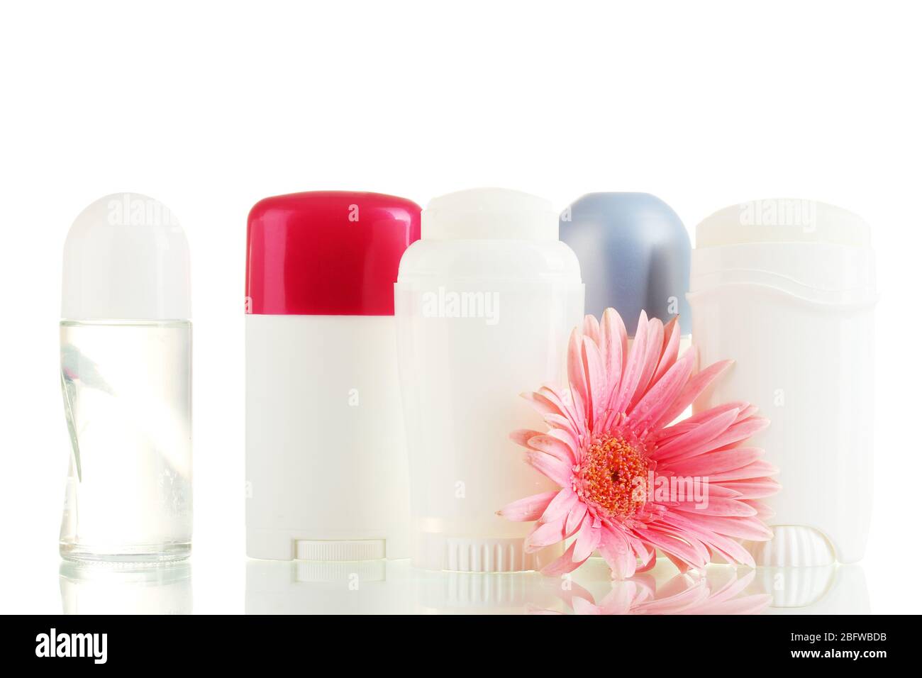 deodorants with flower isolated on white Stock Photo - Alamy