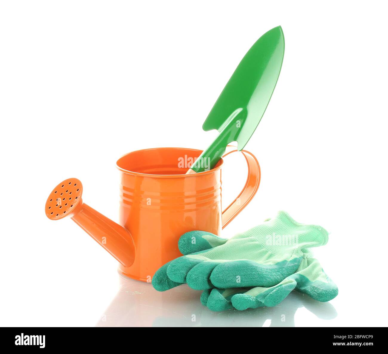 Gardening trowel, watering can and gloves isolated on white Stock Photo ...