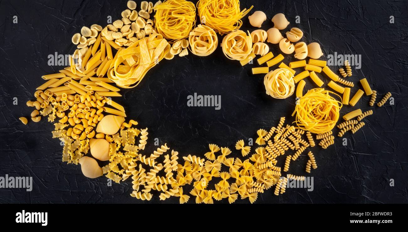Italian pasta panoramic design with copyspace, a flatlay of many pasta ...