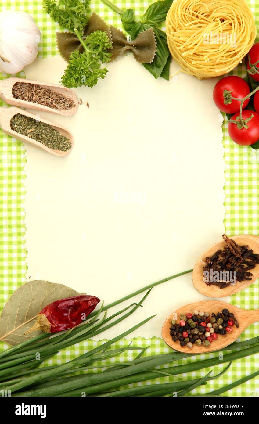 paper for recipes,vegetables and spices on green background Stock Photo ...