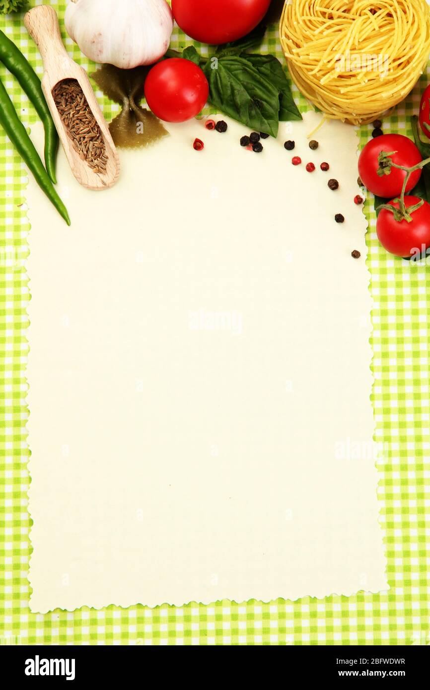 paper for recipes,vegetables and spices on green background Stock Photo ...