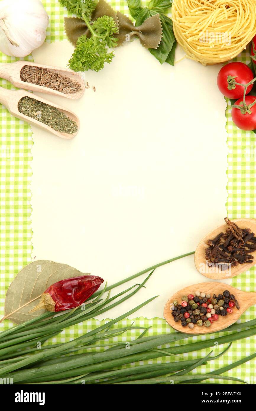 paper for recipes,vegetables and spices on green background Stock Photo ...