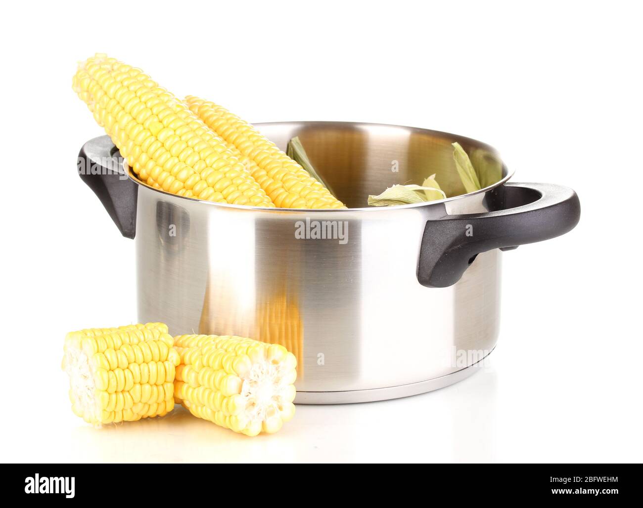 Fresh corn cobs in pot isolated on white Stock Photo - Alamy