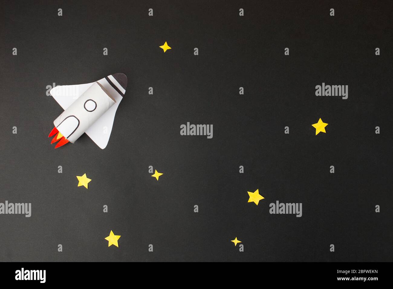 Alone spaceship, shuttle, rocket on black background with copy space ...