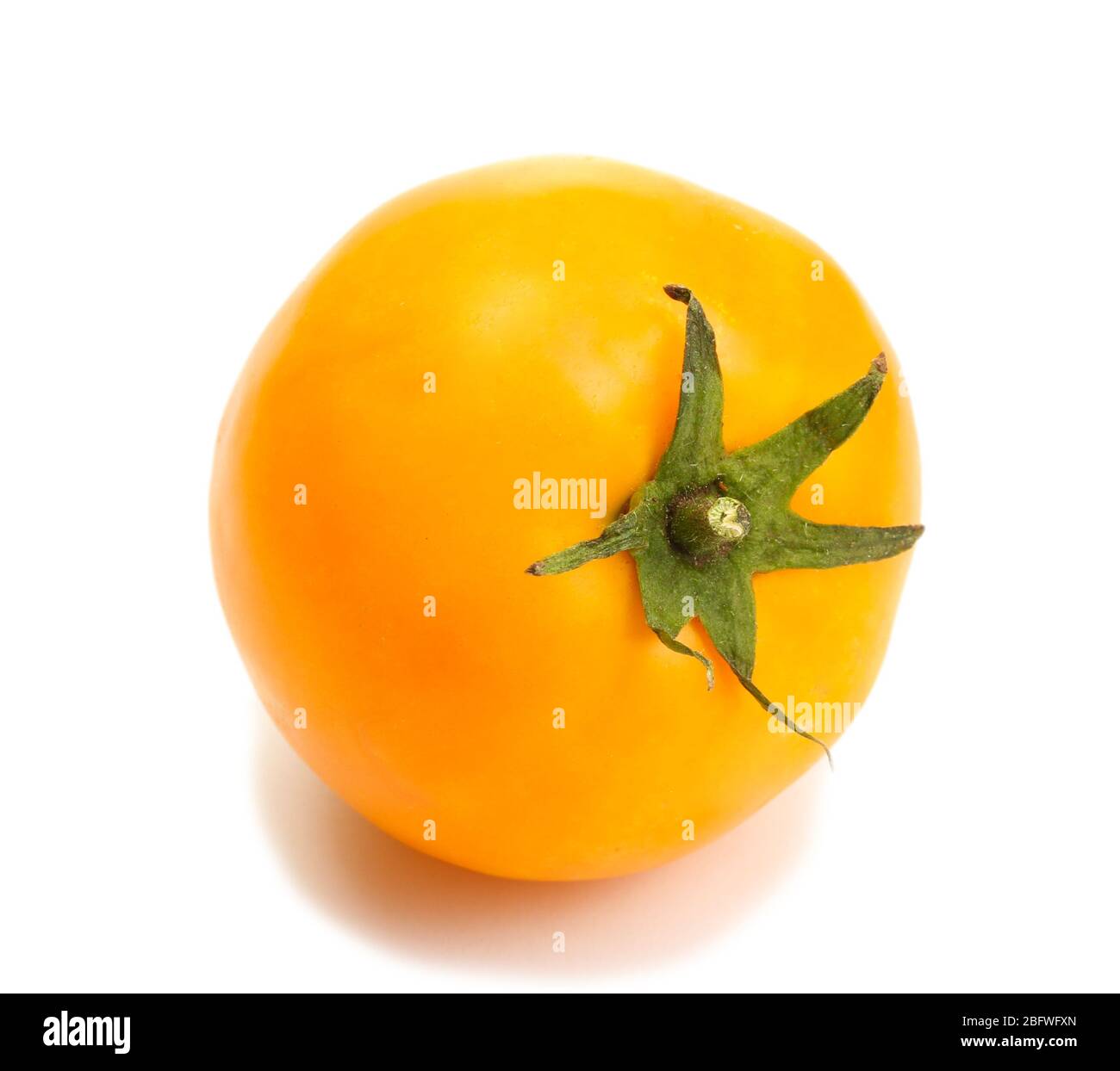 yellow tomato isolated on white Stock Photo - Alamy