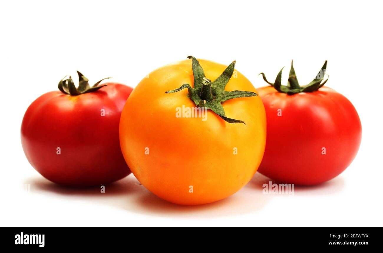 red and yellow tomatoes isolated on white Stock Photo - Alamy
