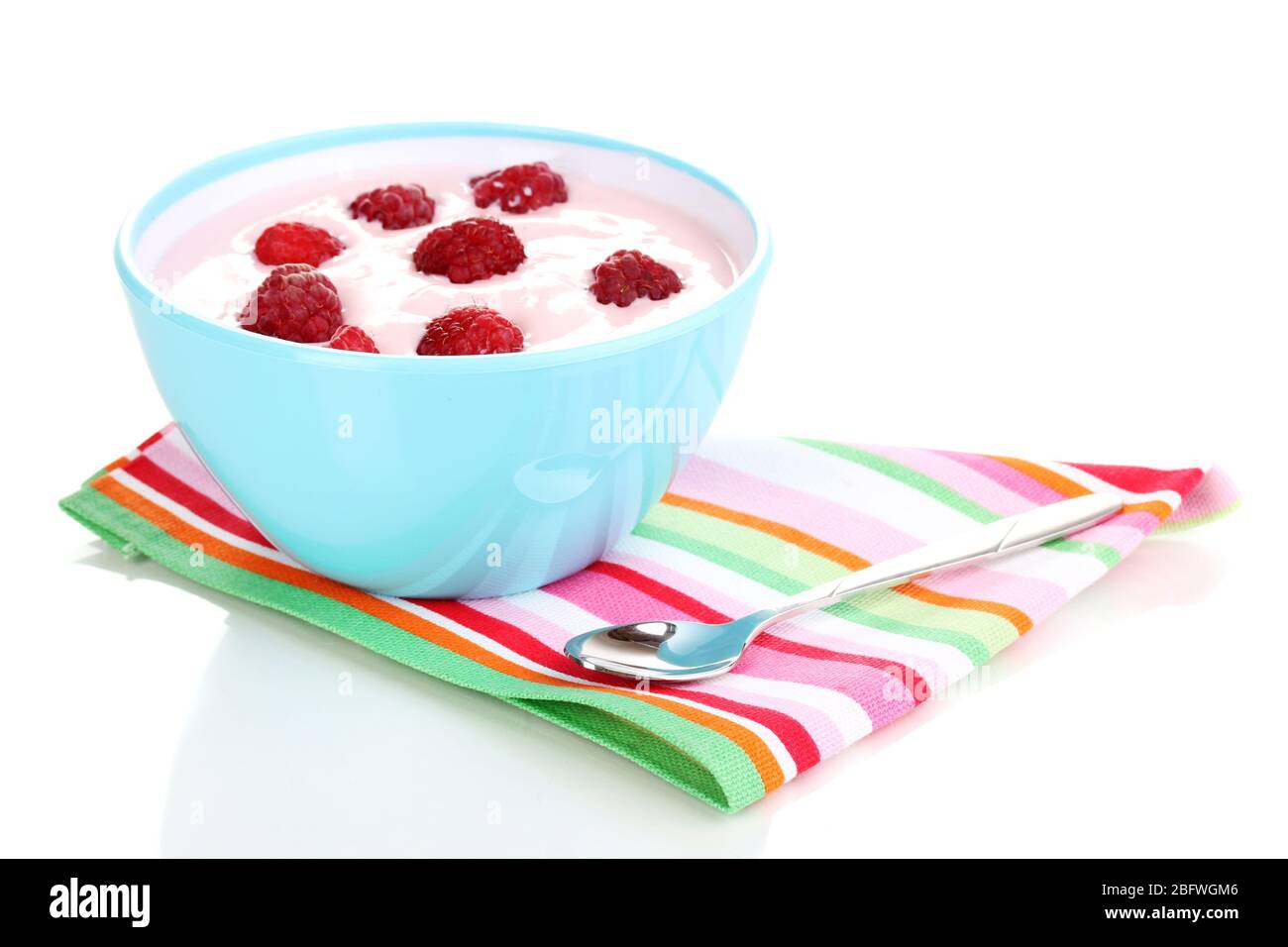 Yogurt with raspberries isolated on white Stock Photo - Alamy