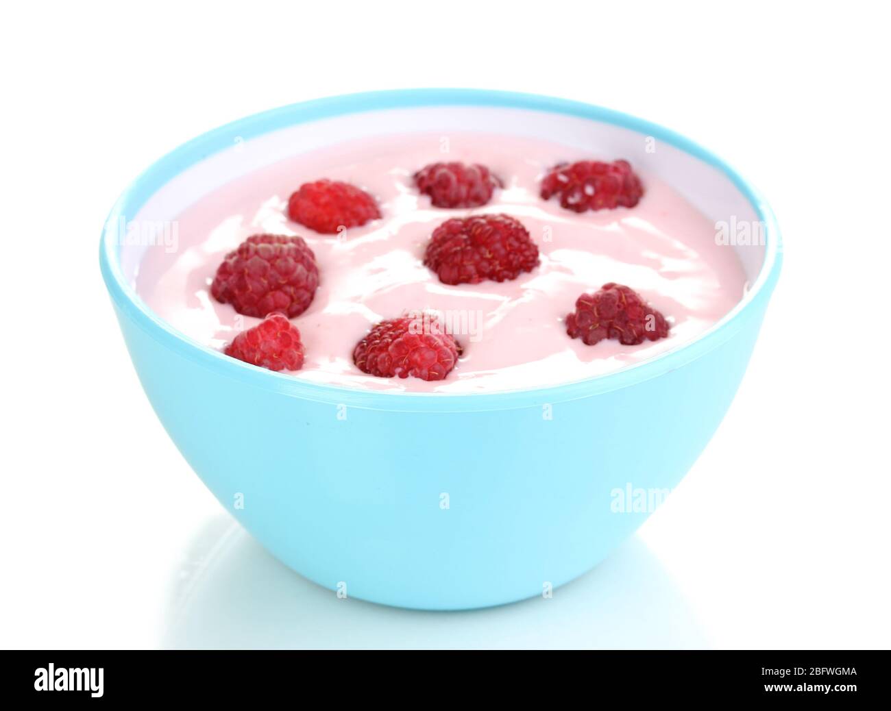 Yogurt with raspberries isolated on white Stock Photo - Alamy