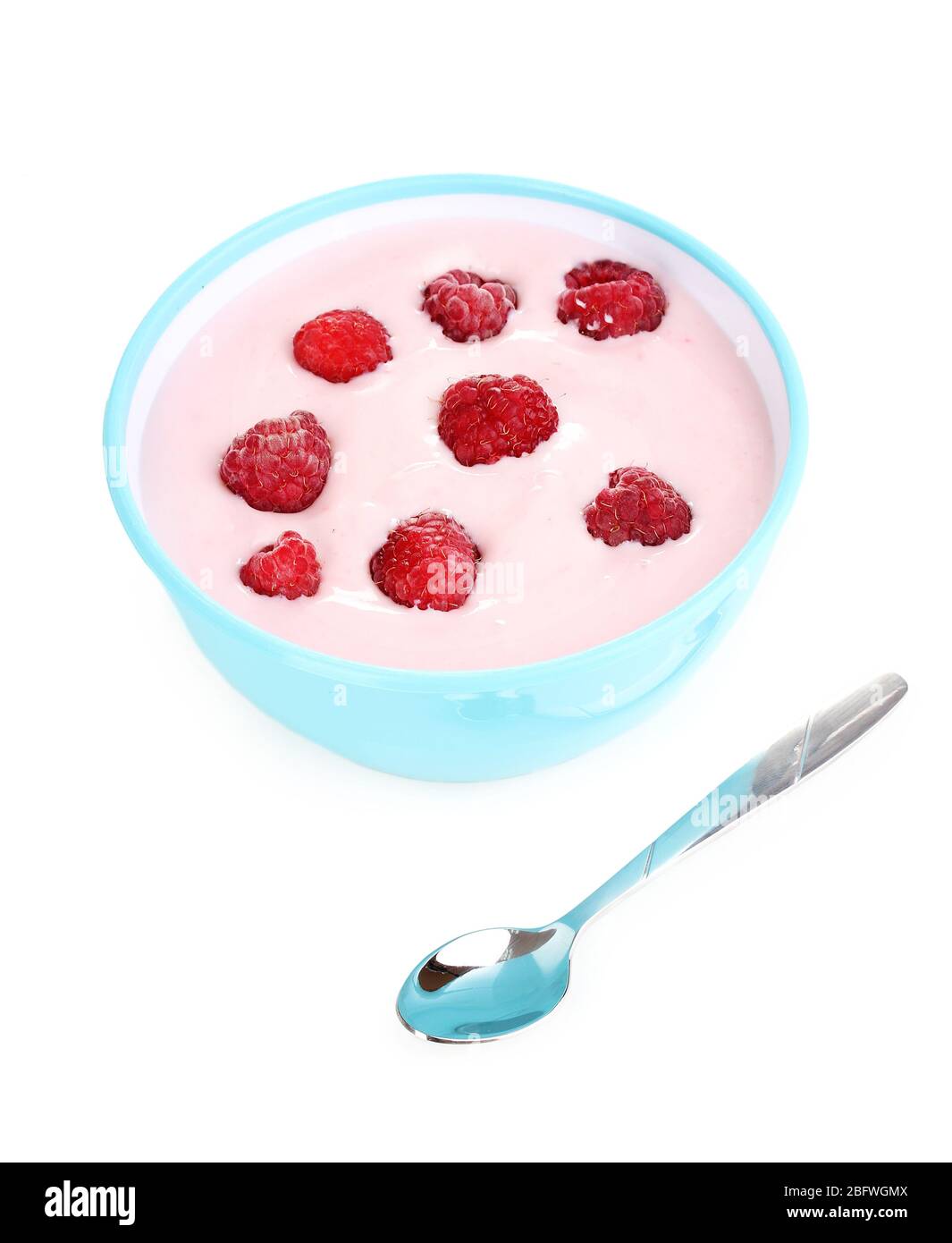 Yogurt with raspberries isolated on white Stock Photo - Alamy