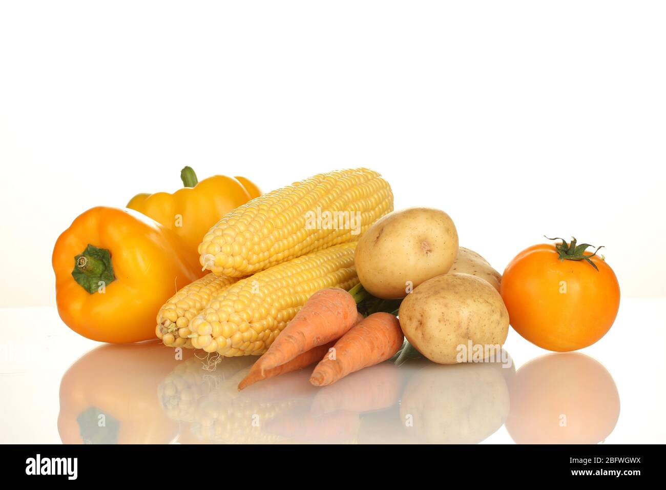 Yellow vegetables isolated on white Stock Photo - Alamy