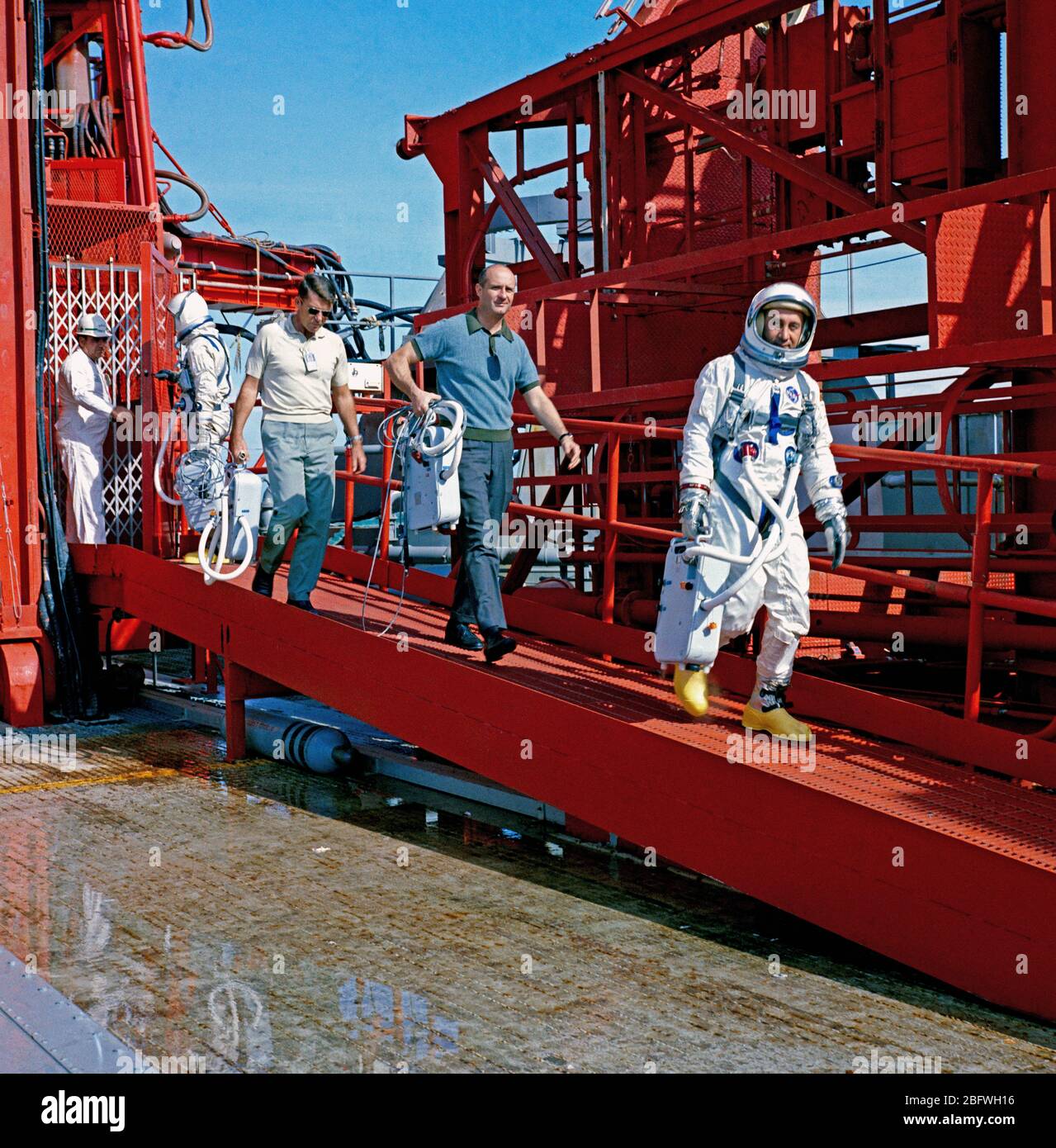 Astronauts John W. Young, Walter M. Schirra Jr., Thomas P. Stafford and ...
